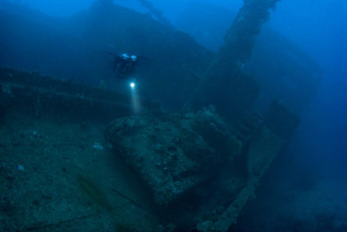 Divers find rare 1940s Ford Woody car in sunken WWII aircraft carrier